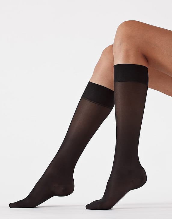 Støttestrømper & Flystrømper - Undgå hævede ben og fødder