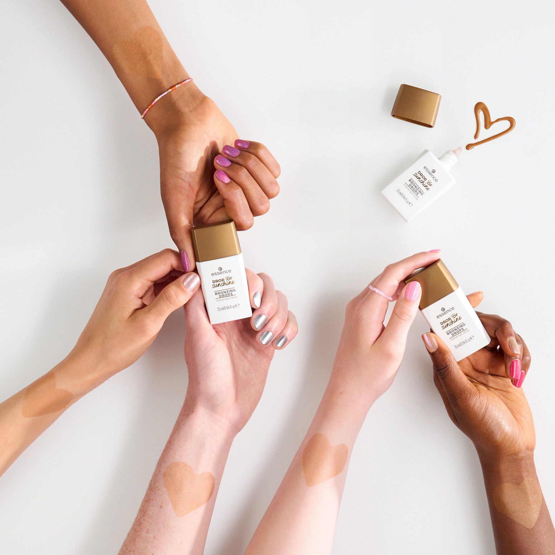 Køb Drop Of Sunshine Bronzing Drops Brown fra Essence - Matas